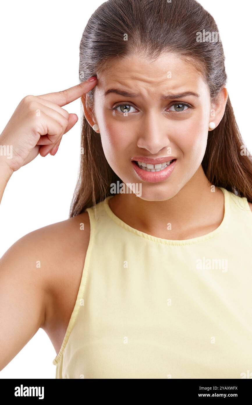 Confused, woman and pointing to head in portrait for judgement, sarcasm ...