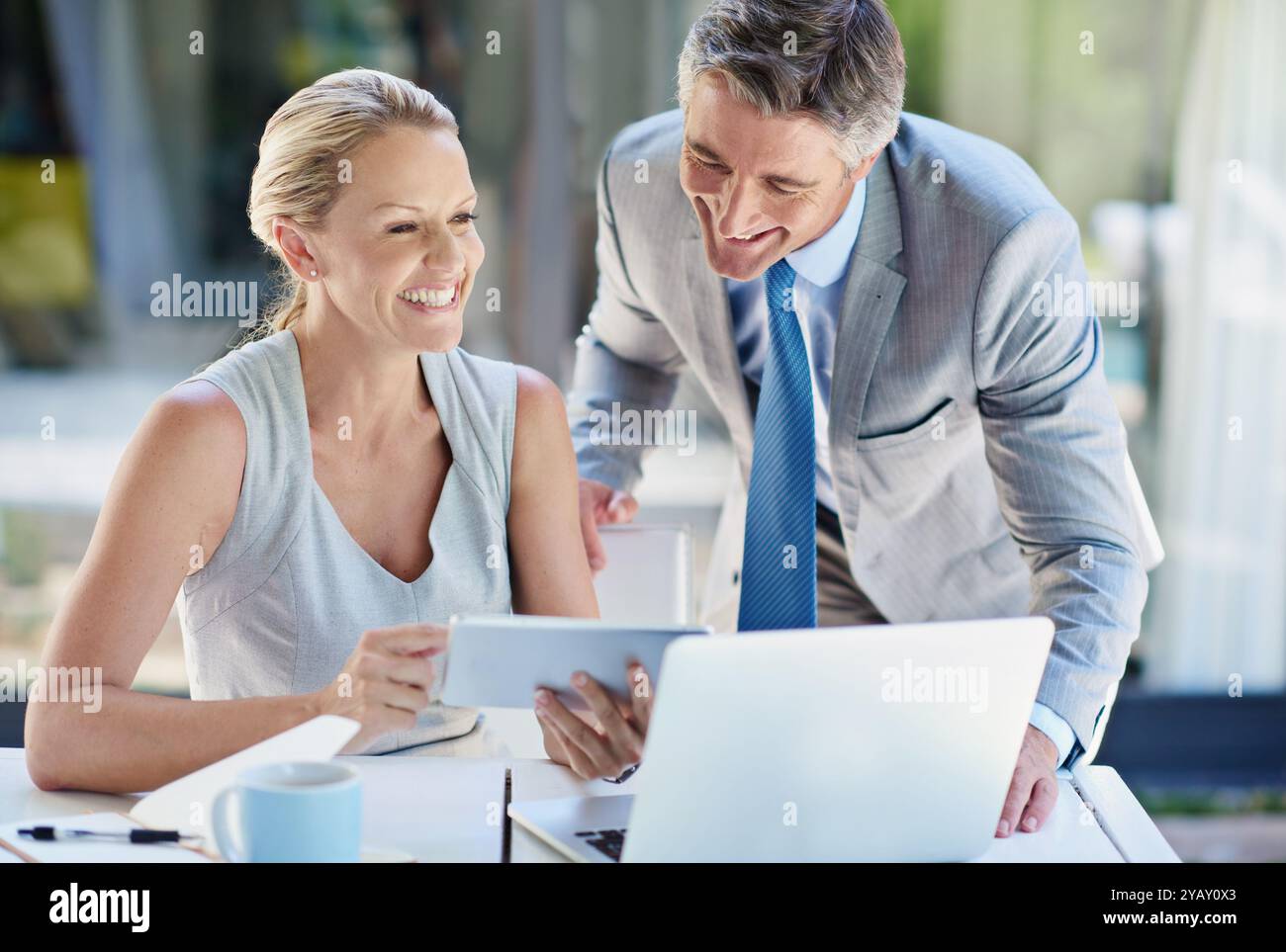 Happy, research and teamwork with business people and tablet for ...