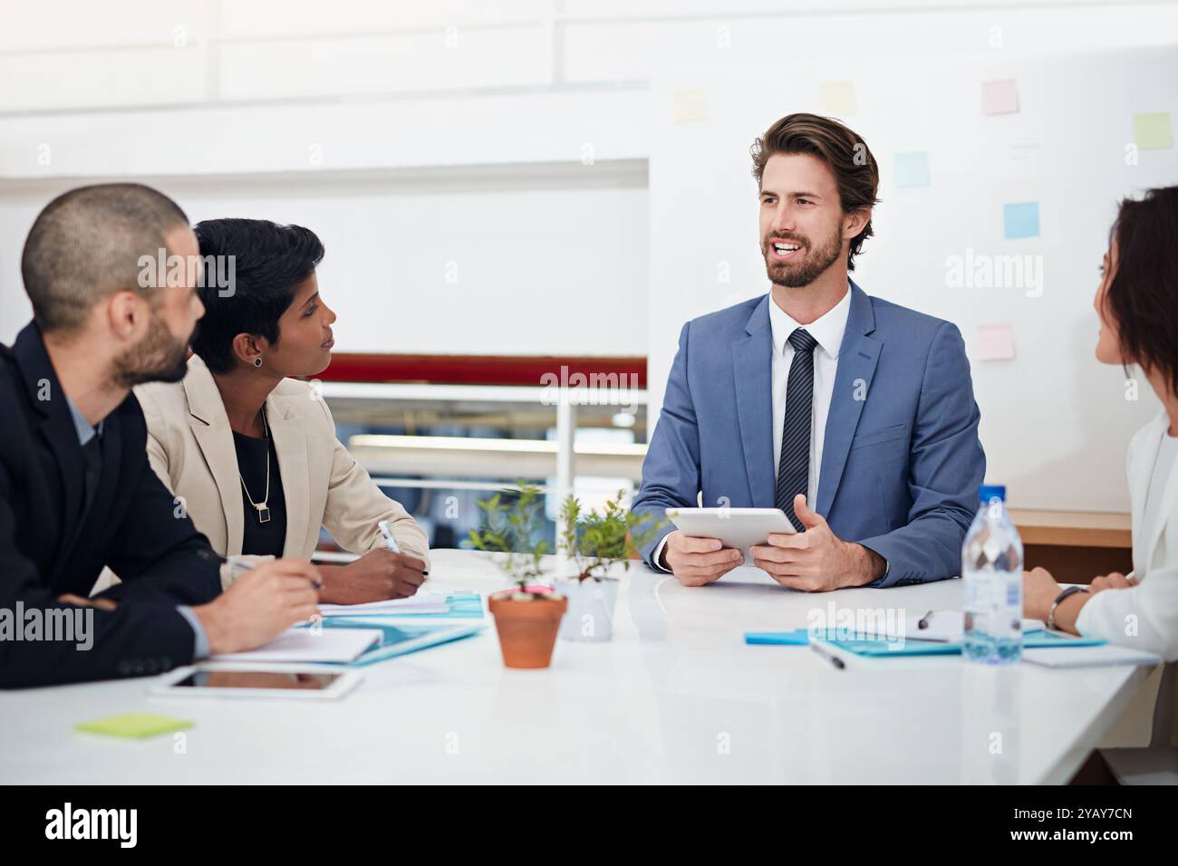 Corporate, discussion and group with tablet, boardroom and conversation ...