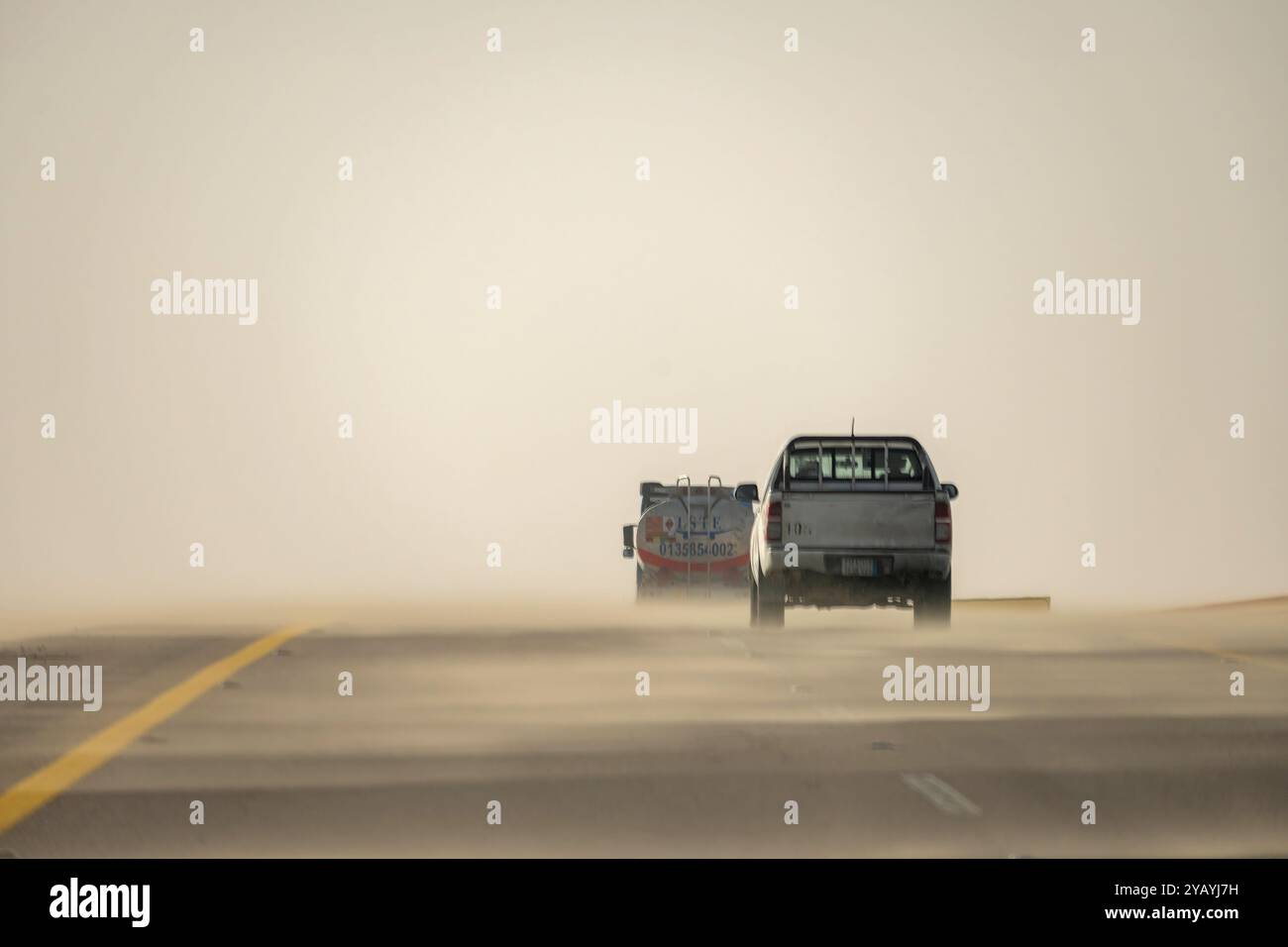 Sand storm in desert road Saudi Arabia Stock Photo - Alamy