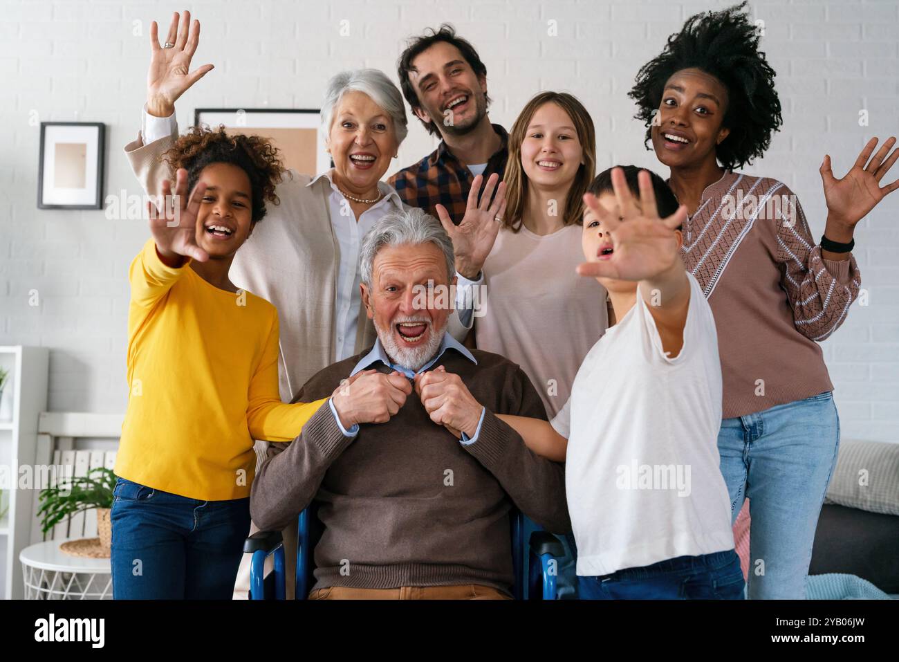 Extended multiethnic diverse family with children,grandparents and parents having fun together ...