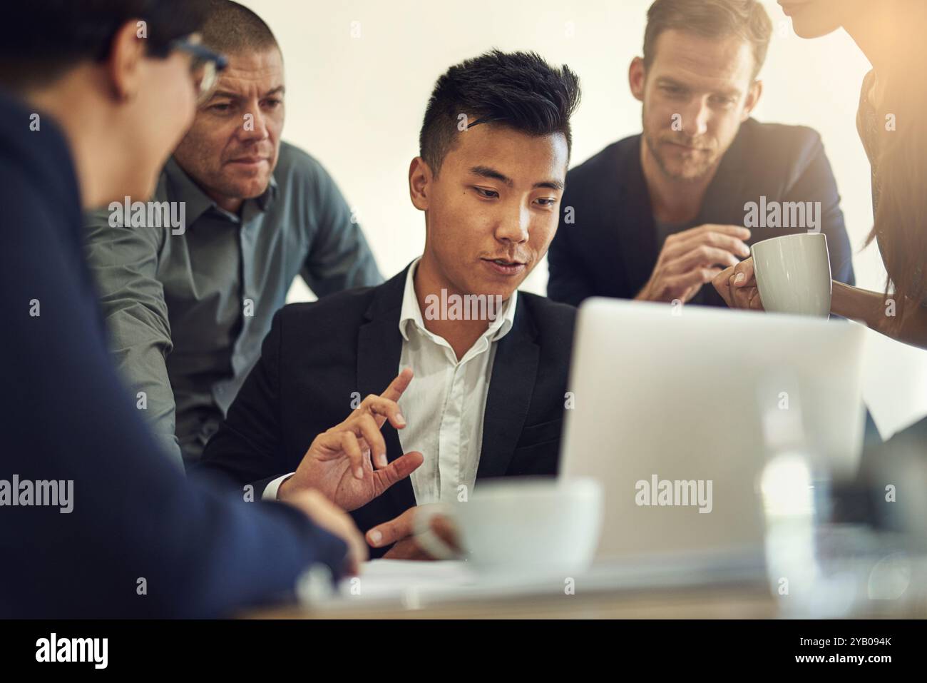 Office, discussion and group with laptop, ideas and collaboration for ...