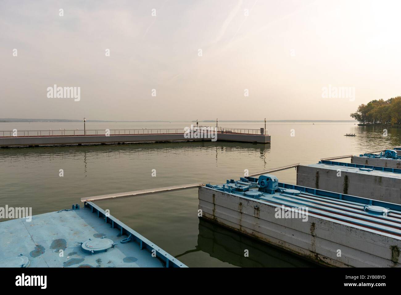 Pontoon bridge with a pier on the lake Stock Photo - Alamy