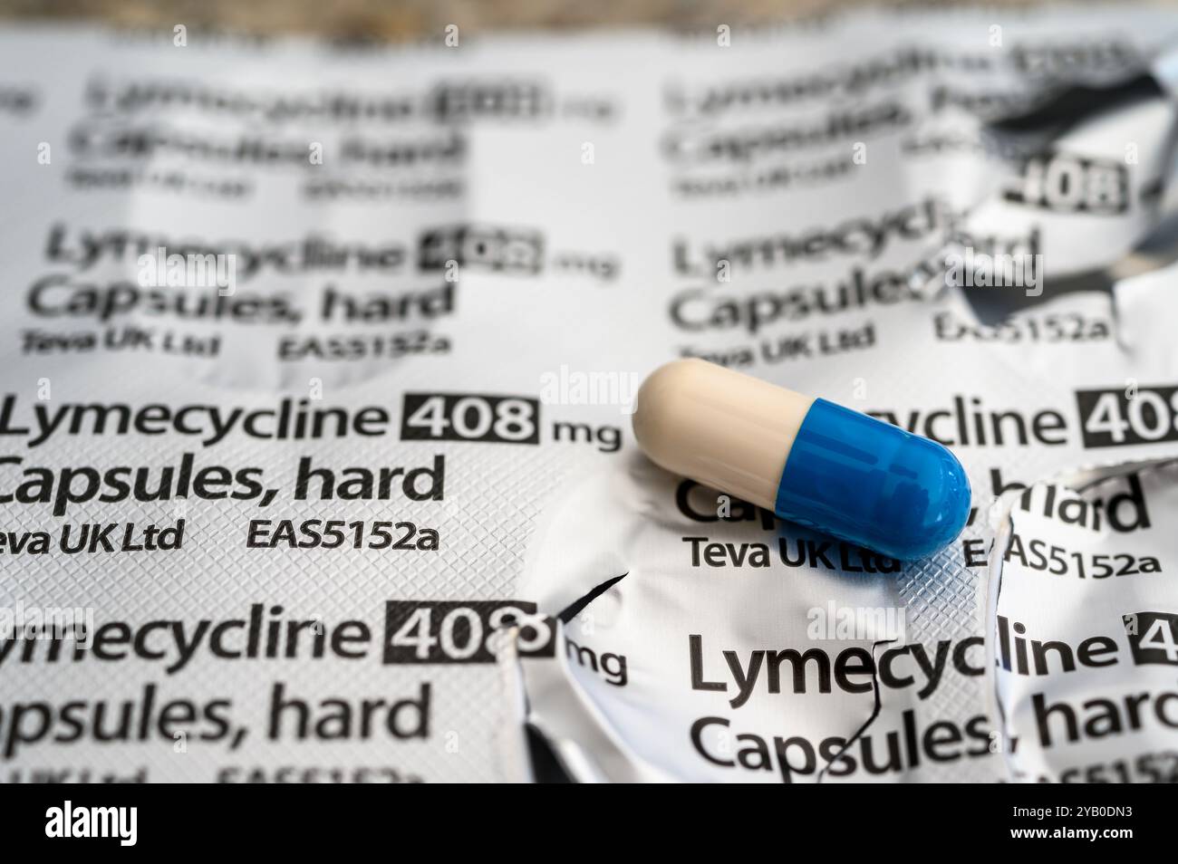 Closeup of a single capsule of 408 mg Lymecycline medicine by Hillcross ...