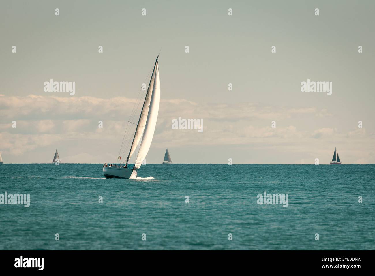 Sailboats in calm sea hi-res stock photography and images - Alamy