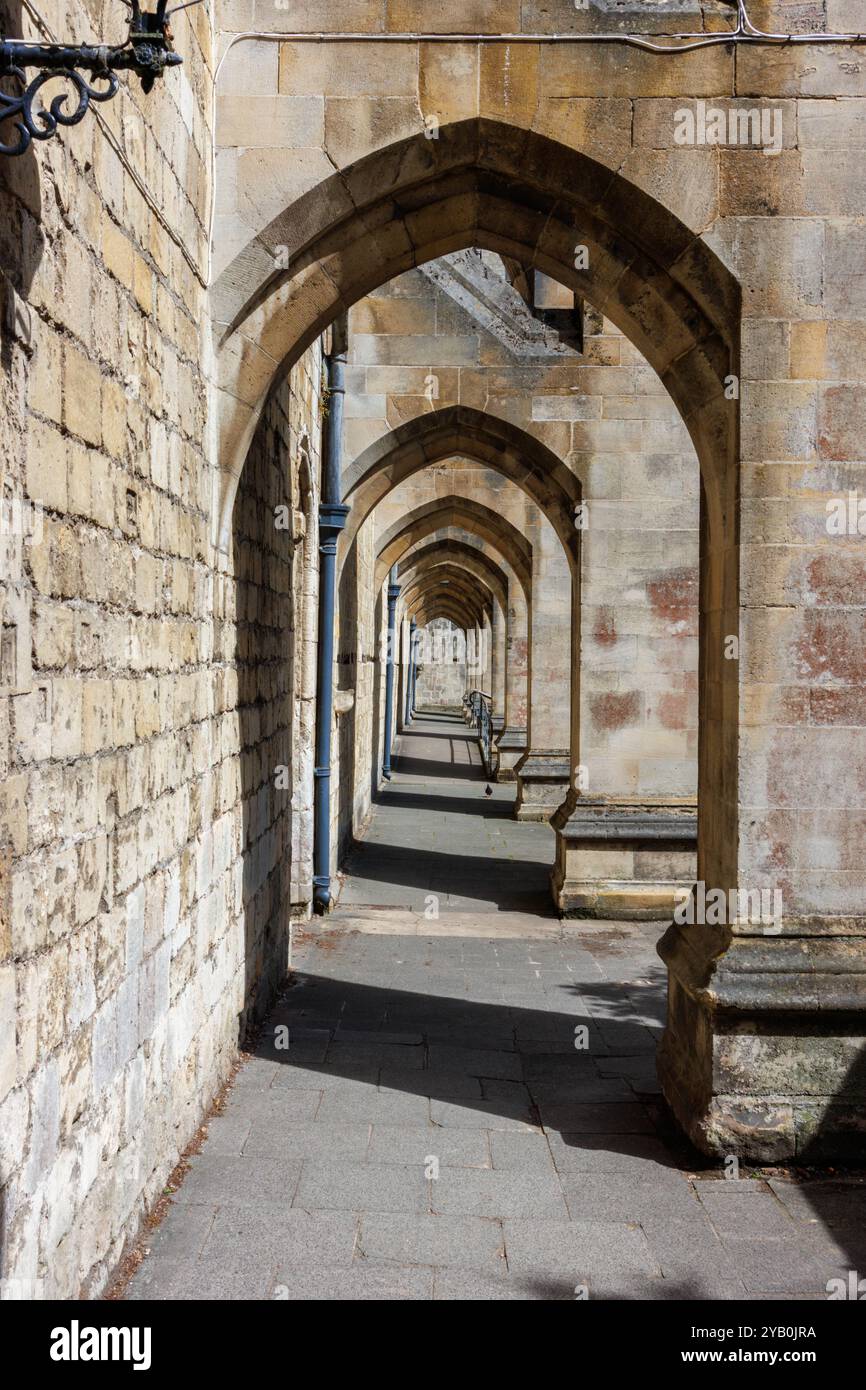 Winchester cathedral arches under flying buttress' Stock Photo - Alamy