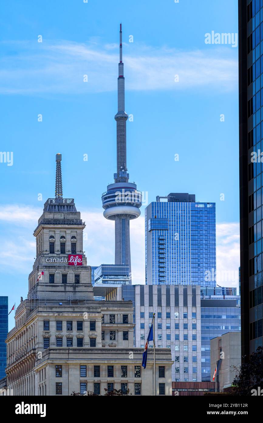 The CN Tower and the Canada Life Building in the downtown district ...