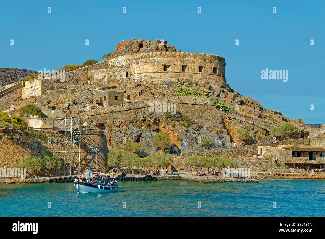Small boat at Spinalonga island, the former Leper Colony, located north ...