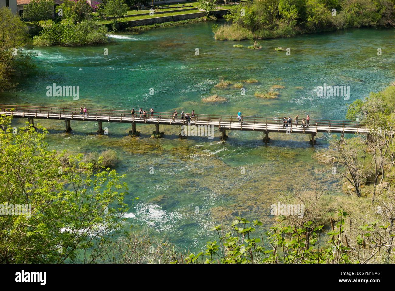 Visitors enjoy the view from extended bridge boardwalk crossing the ...