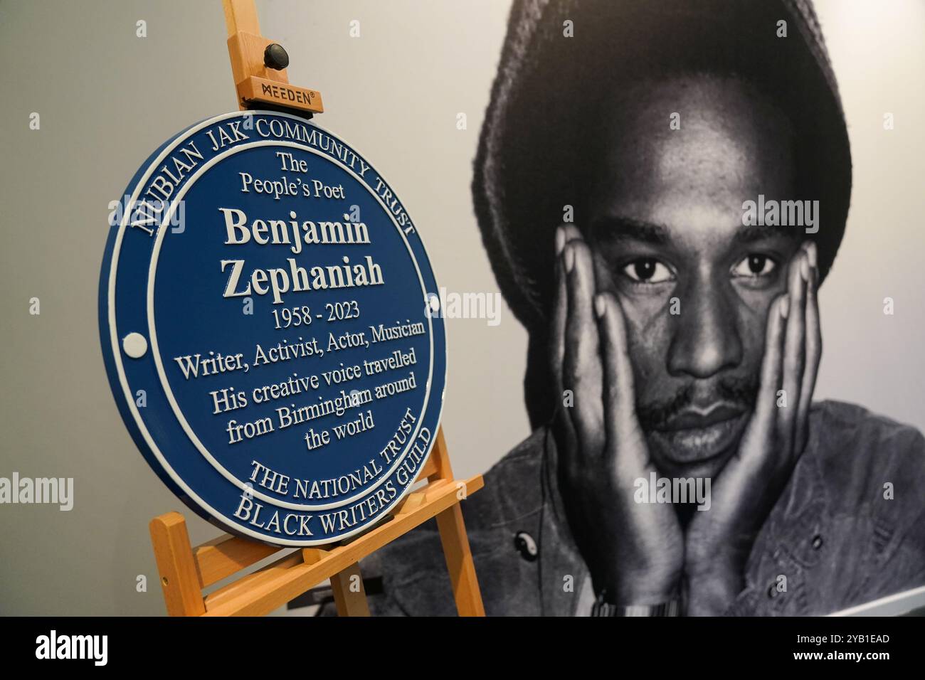 A blue plaque commemorating poet Benjamin Zephaniah during a ceremony ...