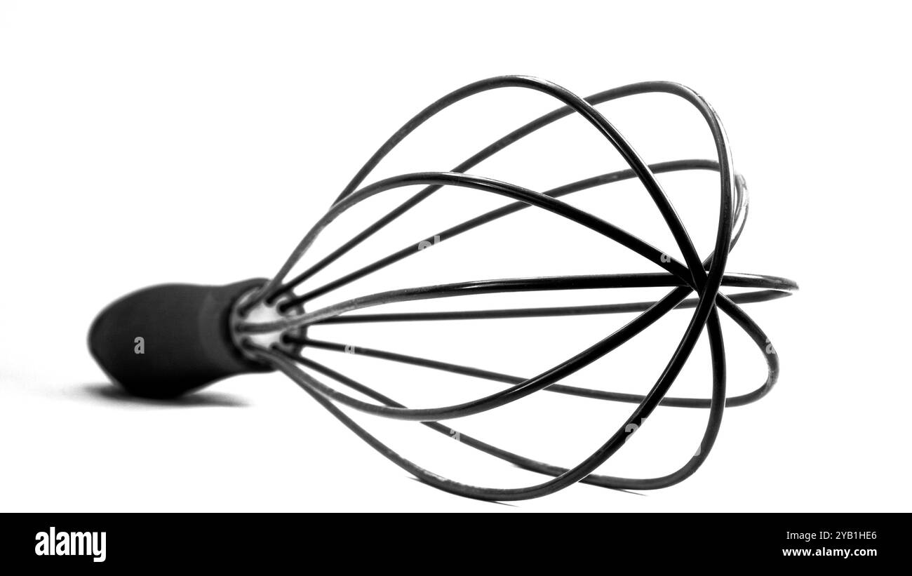 Whisk or egg beater close up. Black and white photo Stock Photo - Alamy