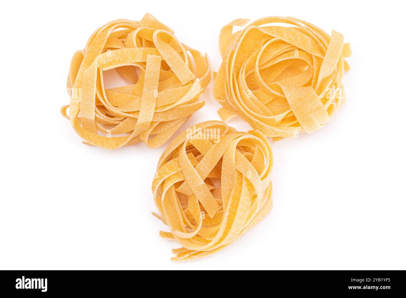 Three Classic Italian Raw Egg Fettuccine - Isolated on White Background ...
