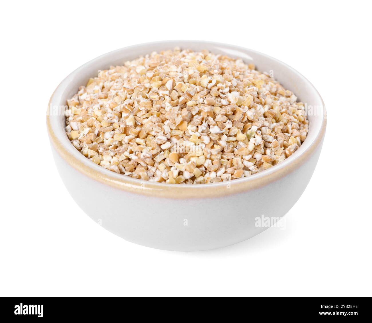 Dry wheat groats in bowl isolated on white Stock Photo - Alamy