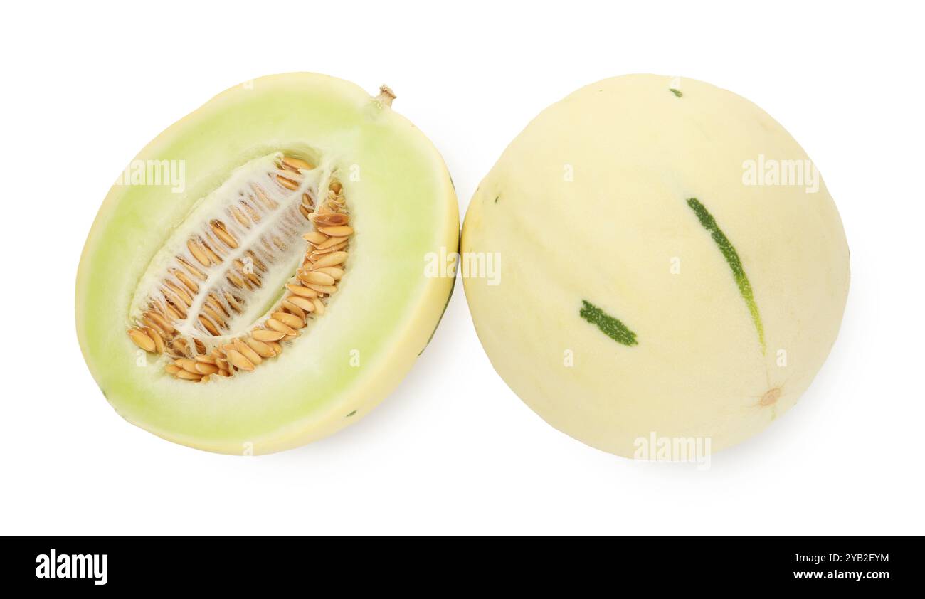 Whole and cut fresh ripe honeydew melons isolated on white Stock Photo ...
