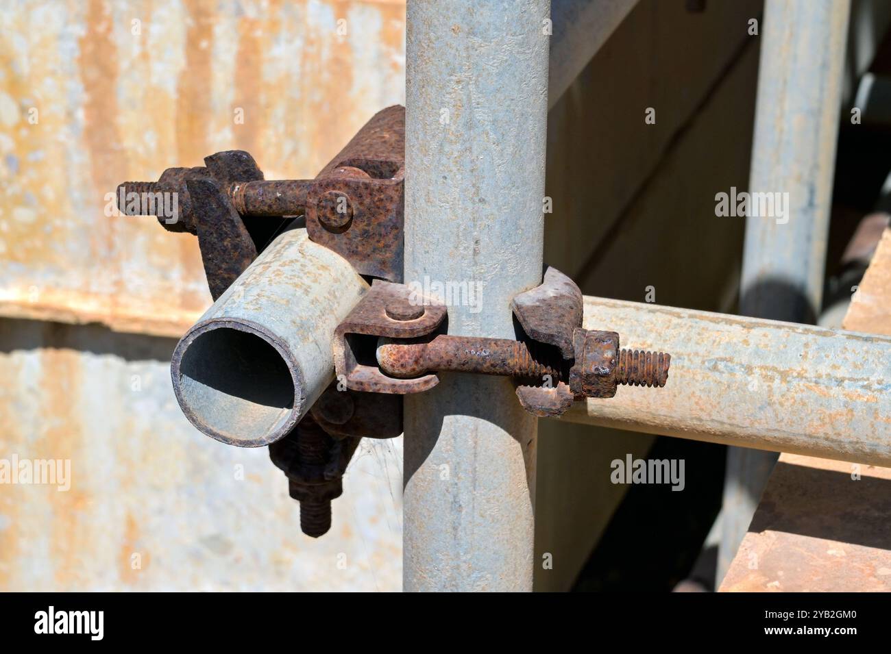 Close up view of the metal connection brackets and bolts on scaffolding ...