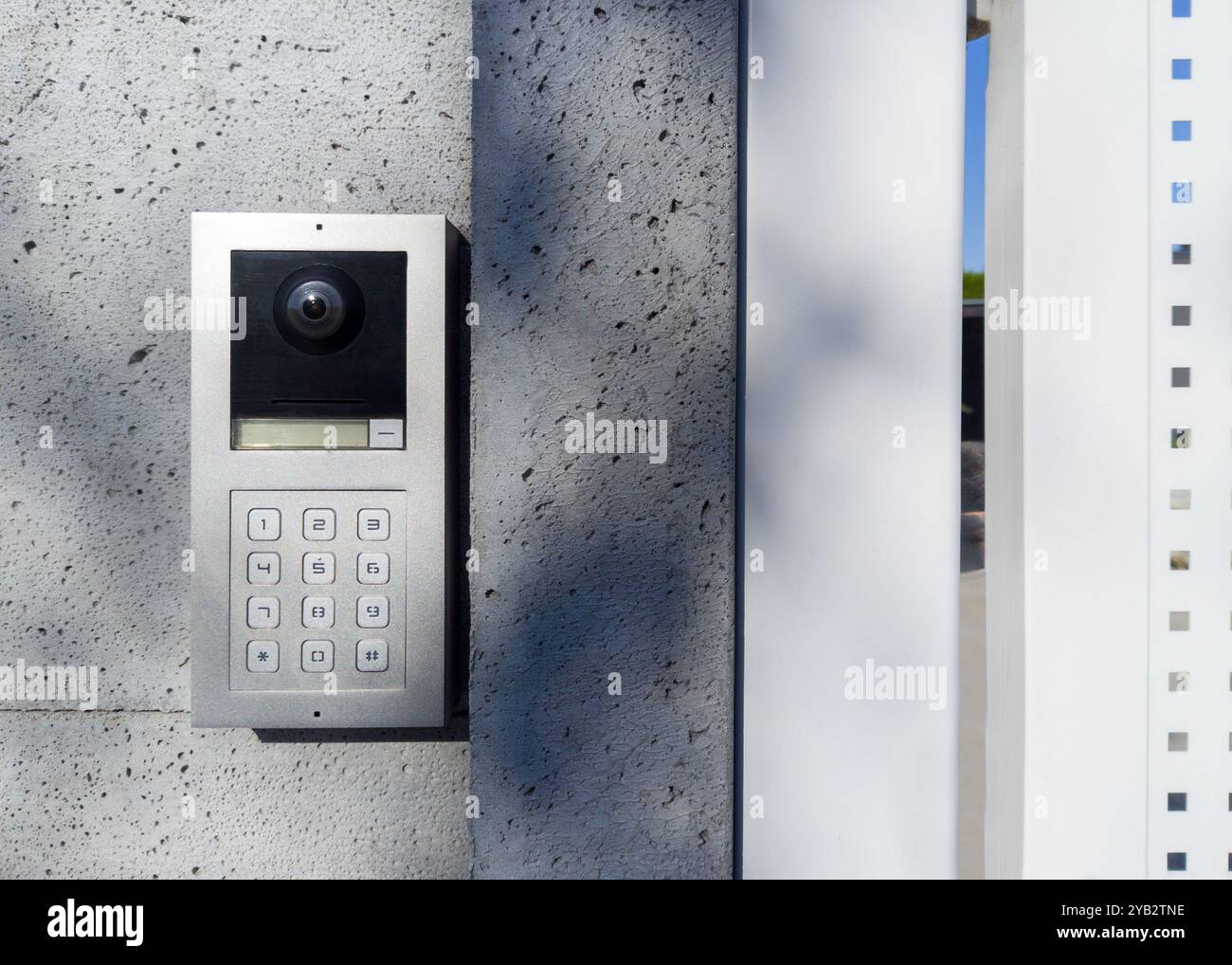 Modern security keypad on outdoor wall Stock Photo - Alamy