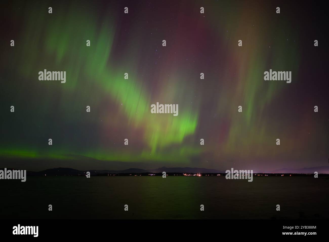 Pastel colors of Aurora Borealis dancing above Padilla Bay in Fall sky ...