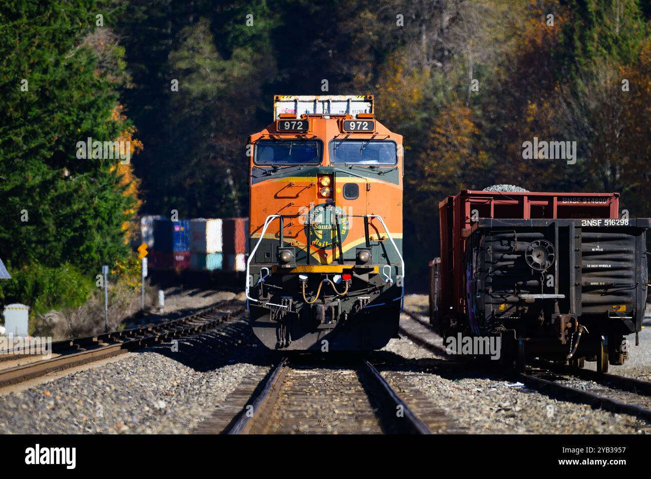 Skykomish, WA, USA - October 12, 2024; BNSF orange freight locomotive on track end view with ...