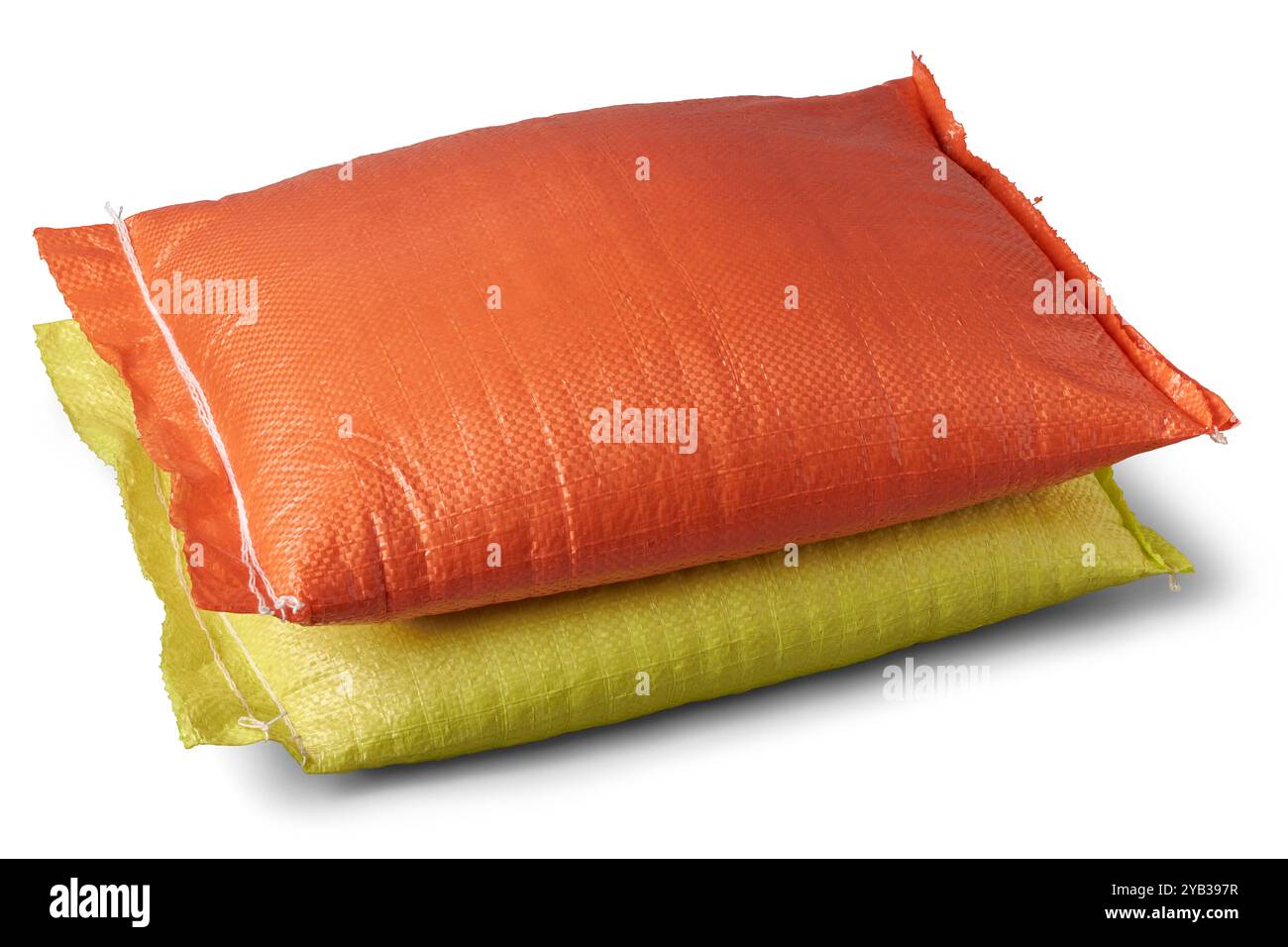 stack of orange and yellow polypropylene pp bag or sack full of rice ...