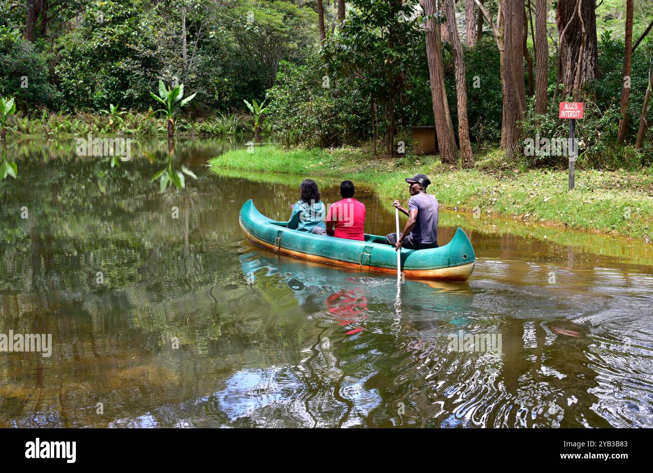 Vakona Forest Natural Reserve, rainforest. Visitors in canoe. Andasibe ...