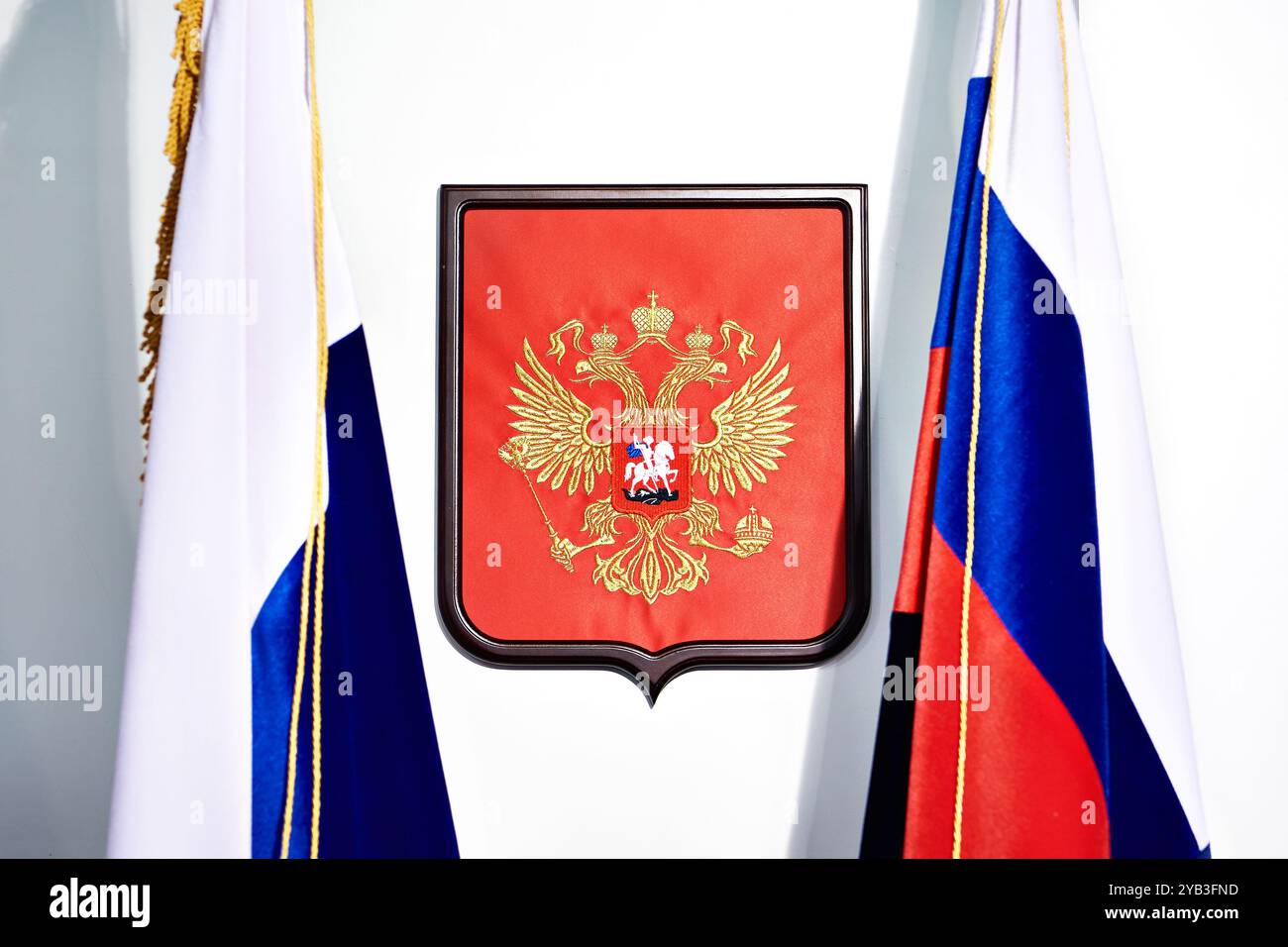 Coat of arms and state flag of Russia on white Stock Photo - Alamy
