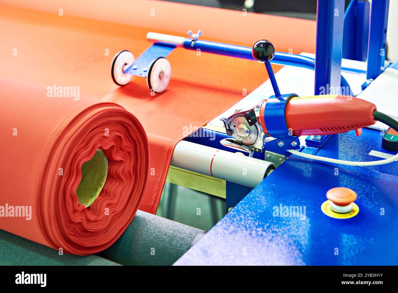 Measuring fabric inspection machine in the workshop Stock Photo - Alamy