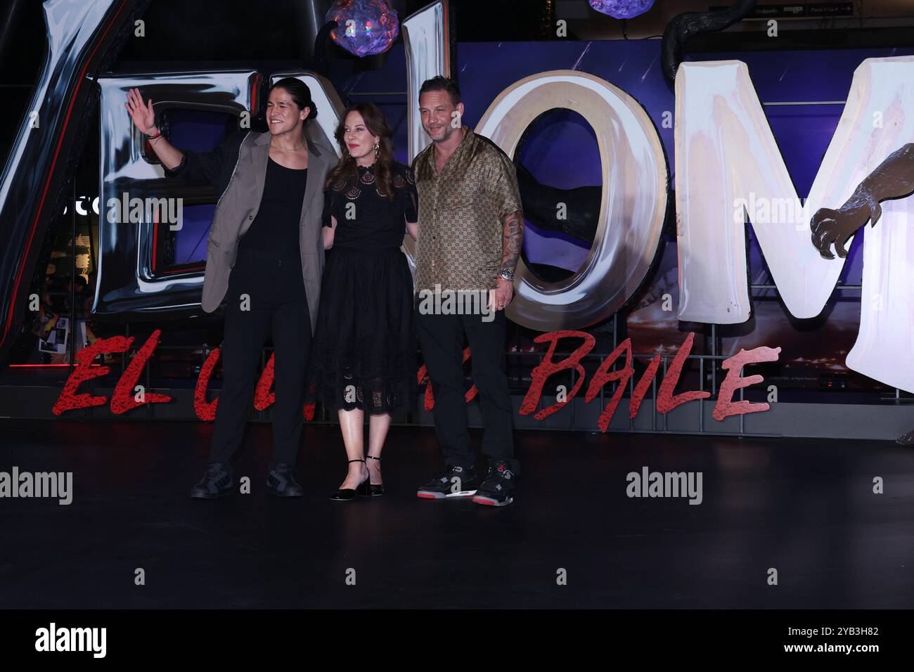 Tom Hardy, Kelly Marcel, and Cristo Fernandez attend the black carpet ...