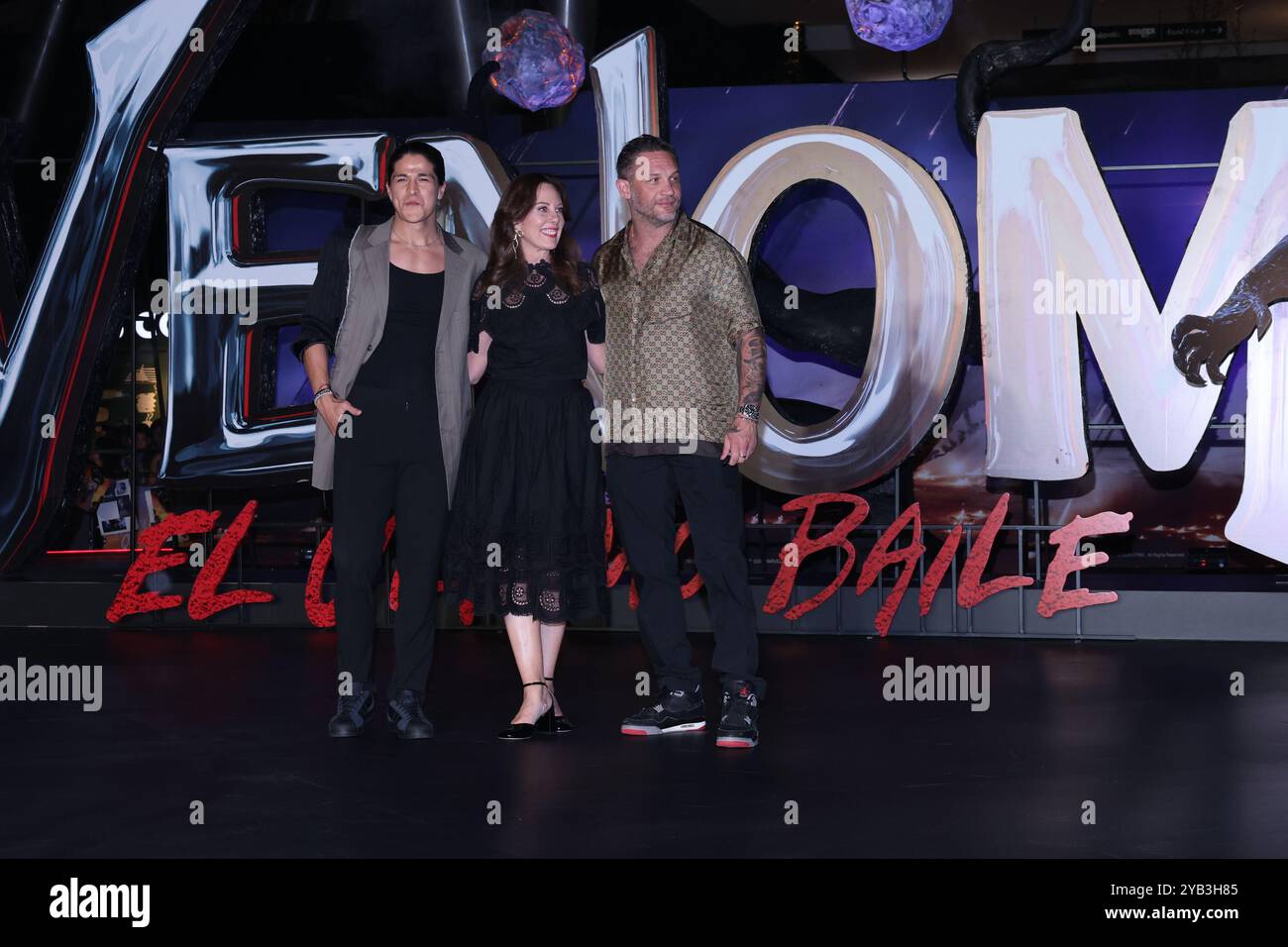 Tom Hardy, Kelly Marcel, and Cristo Fernandez attend the black carpet ...