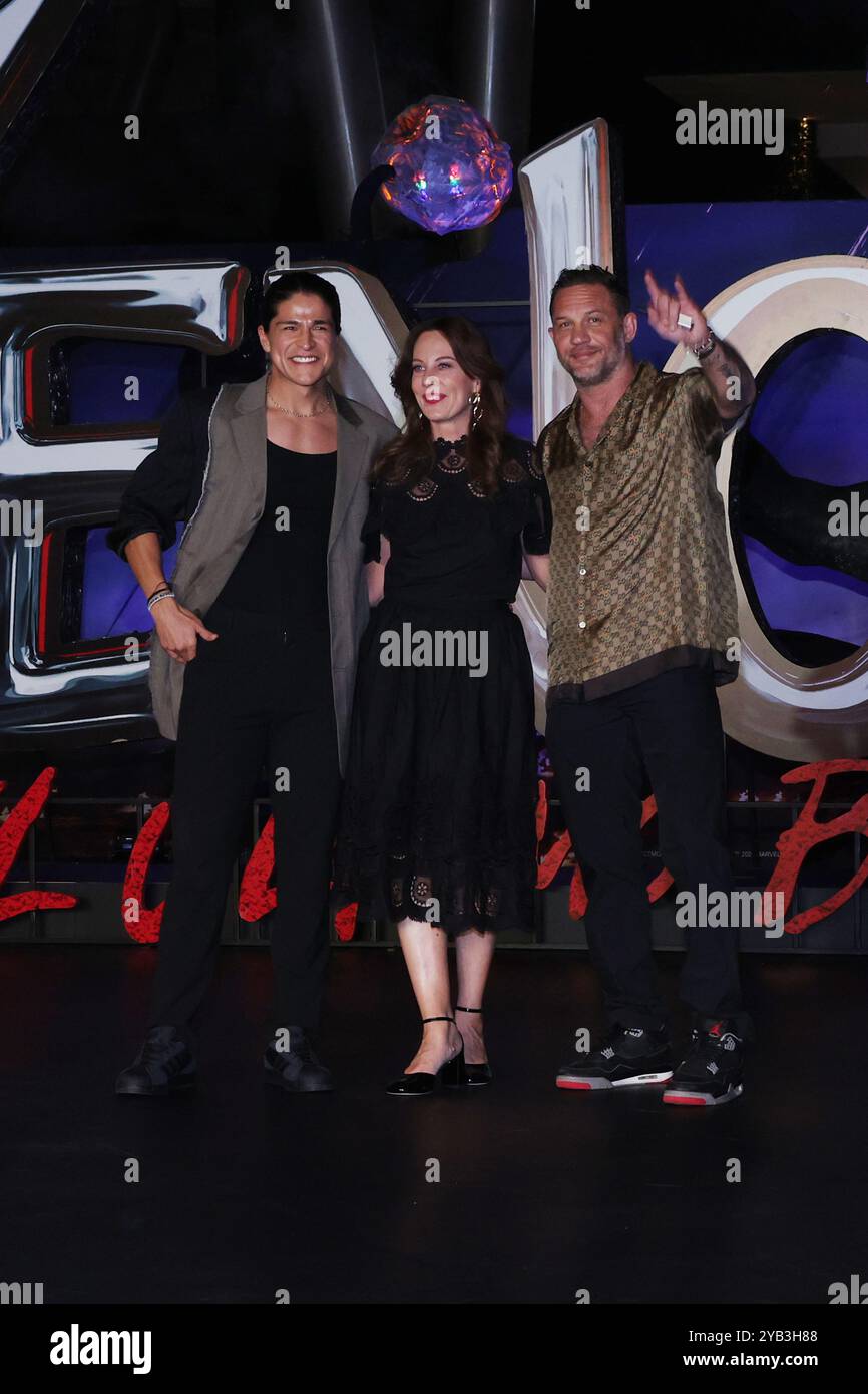 Tom Hardy, Kelly Marcel, and Cristo Fernandez attend the black carpet ...