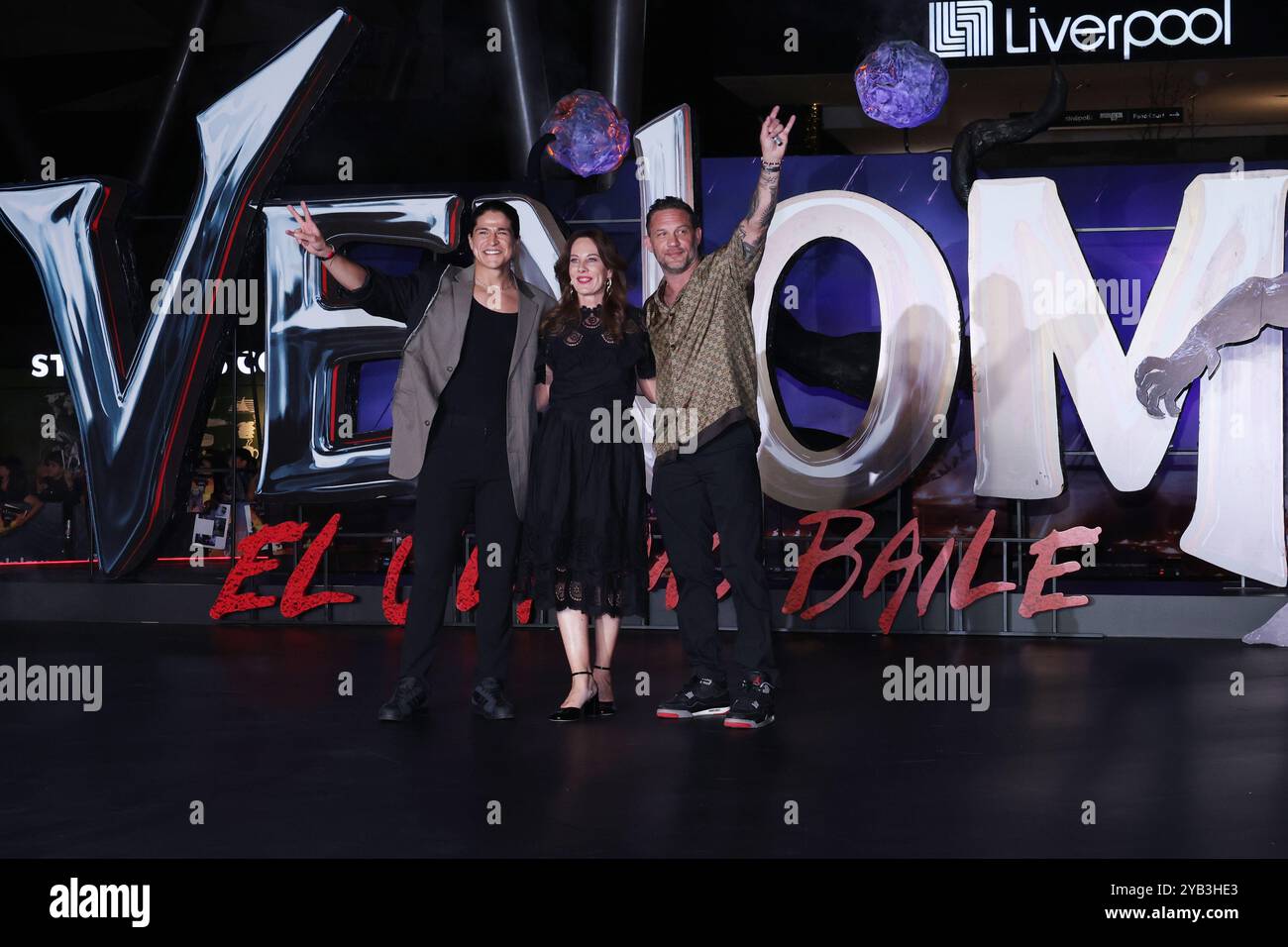 Tom Hardy, Kelly Marcel, and Cristo Fernandez attend the black carpet ...