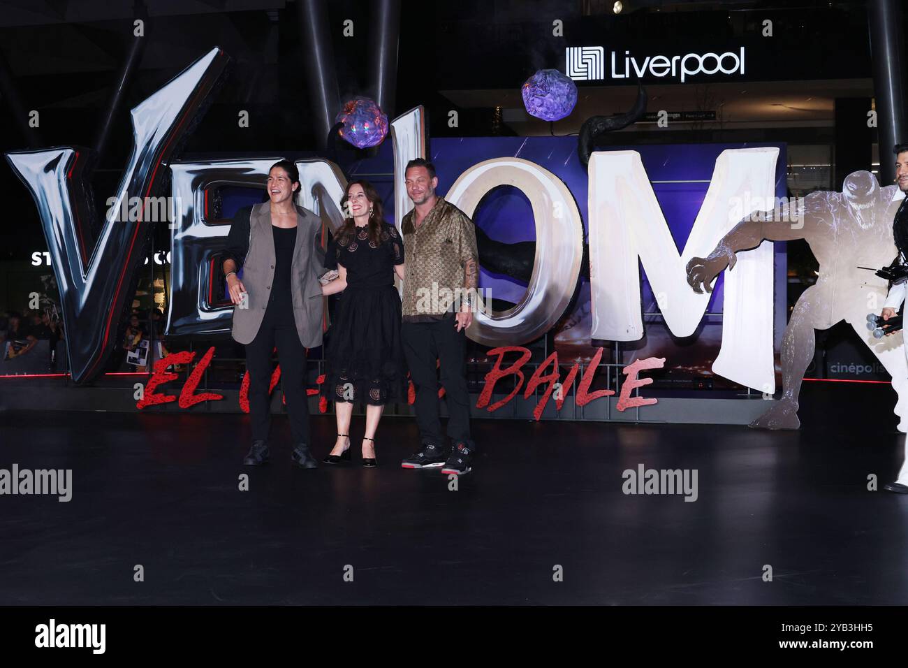 Tom Hardy, Kelly Marcel, and Cristo Fernandez attend the black carpet ...