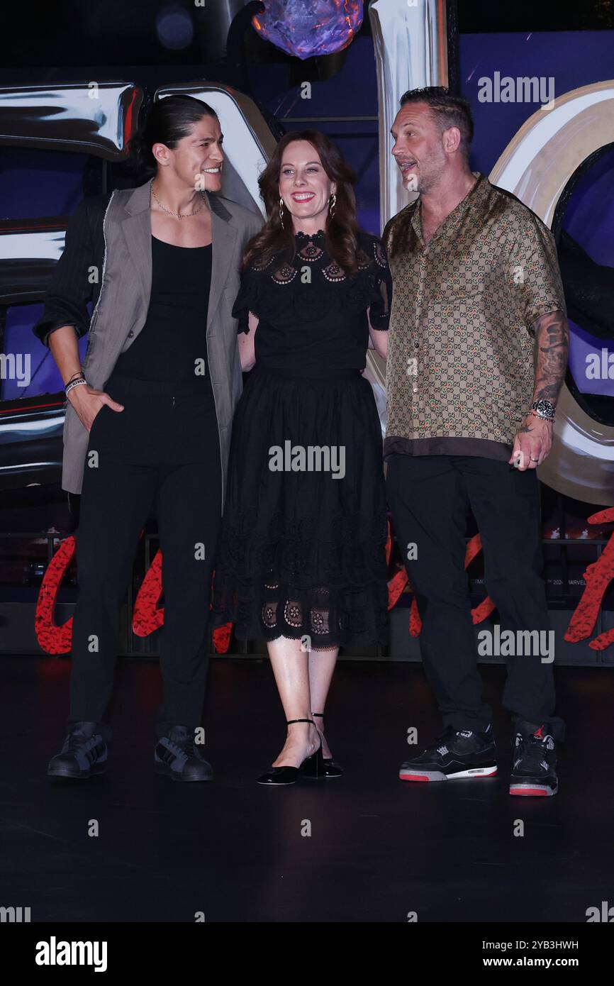 Tom Hardy, Kelly Marcel, and Cristo Fernandez attend the black carpet ...