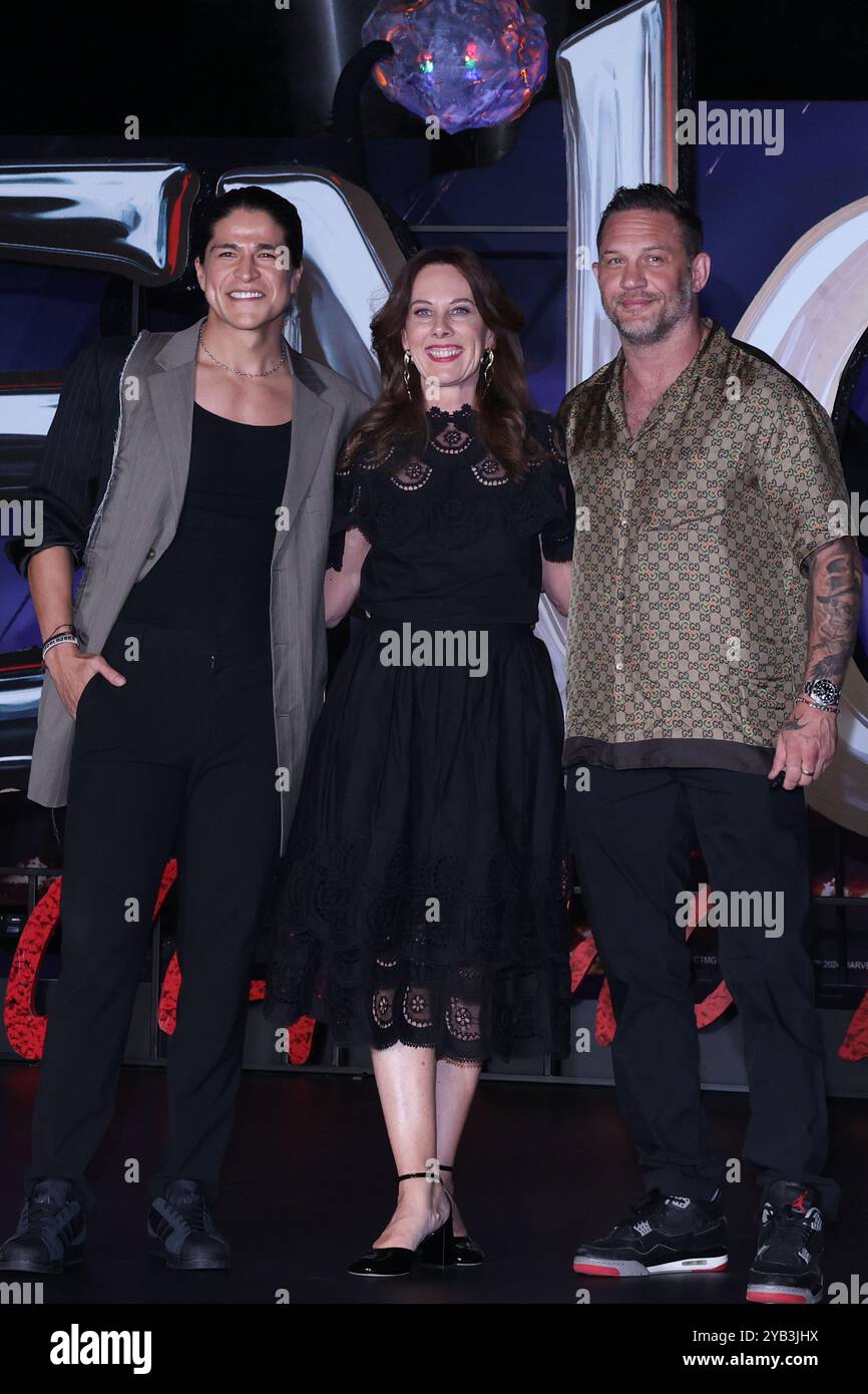 Tom Hardy, Kelly Marcel, and Cristo Fernandez attend the black carpet ...
