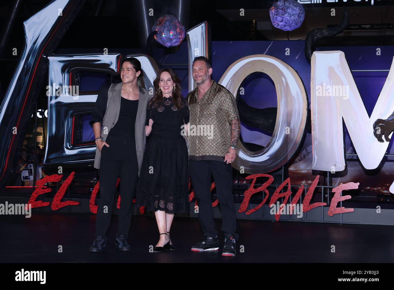 Tom Hardy, Kelly Marcel, and Cristo Fernandez attend the black carpet ...