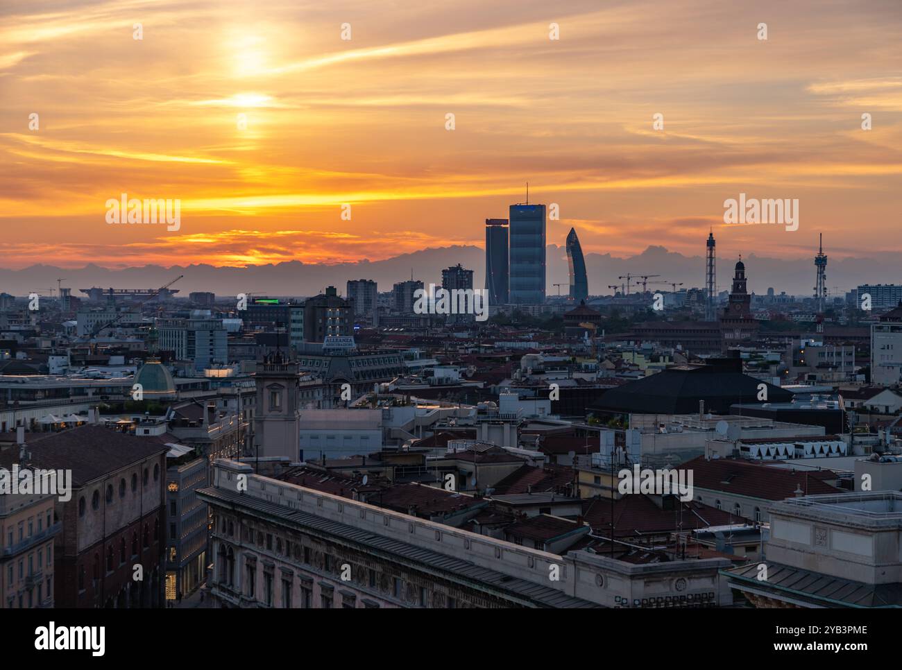 A picture of Milano at sunset, with the CityLife district at the far ...