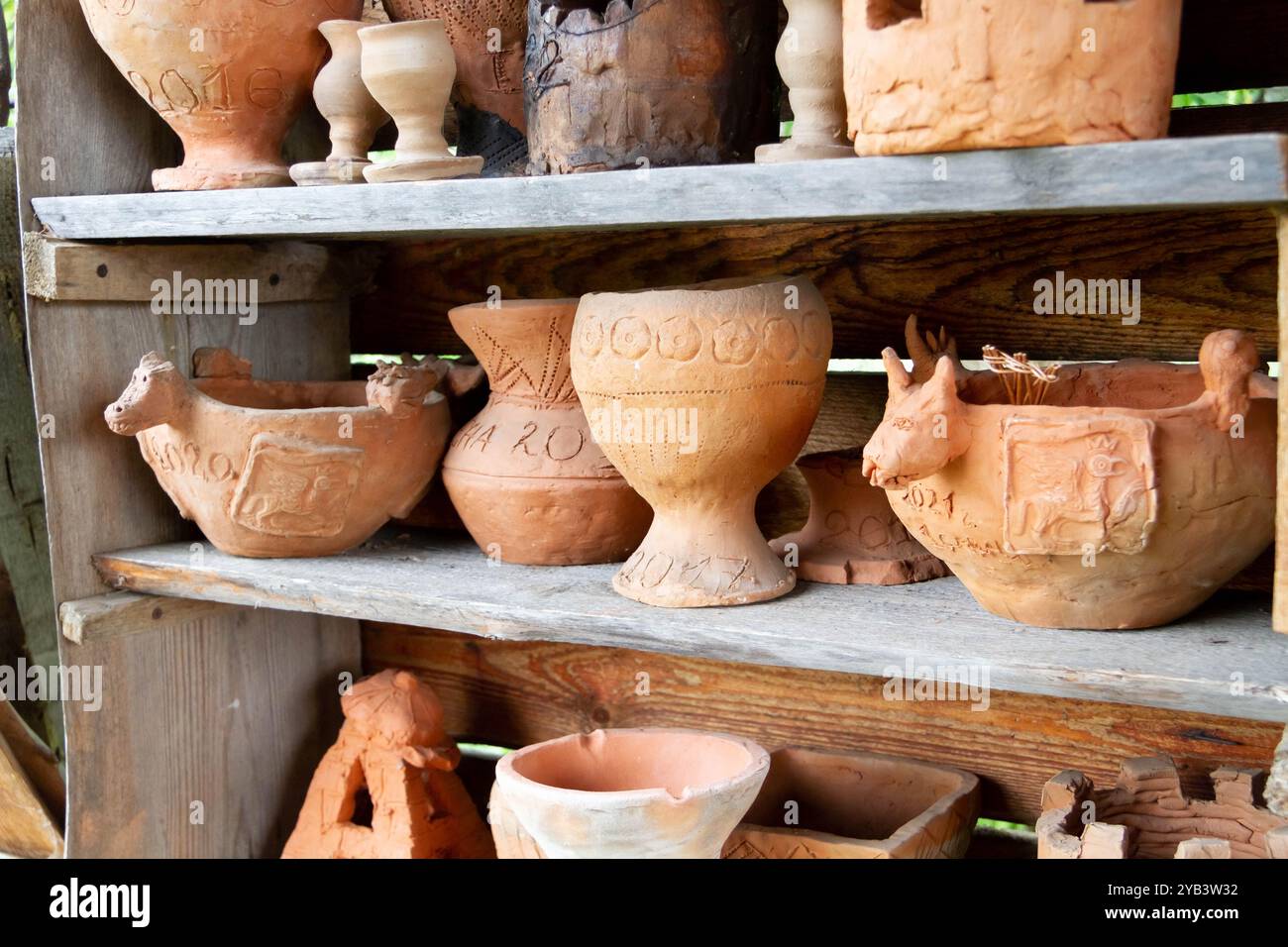 Exhibition of pottery. Pottery. Set of clay pots. The ancient art of ...