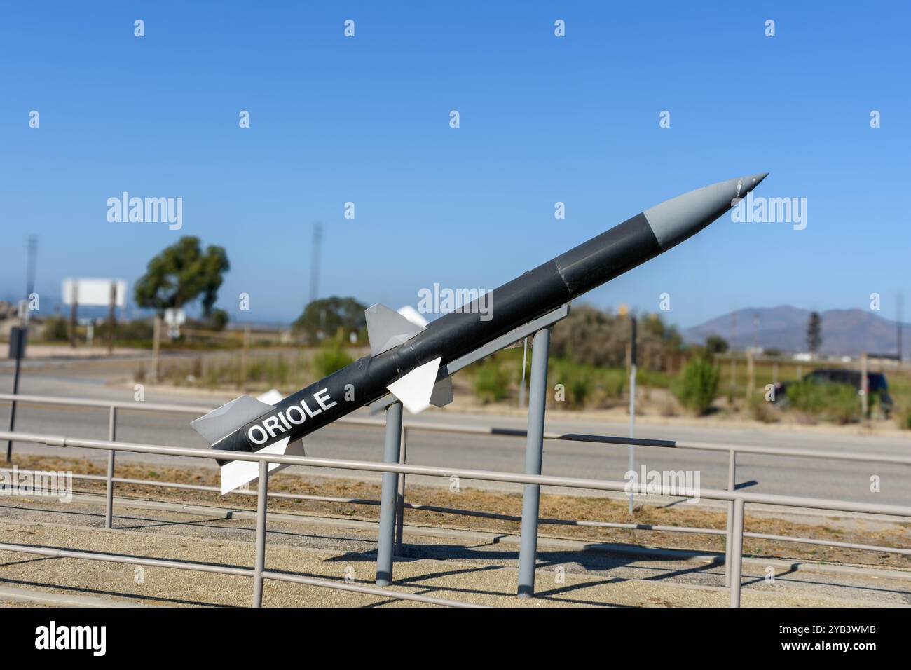 Oriole missile is displayed on a stand in an outdoor military museum at ...
