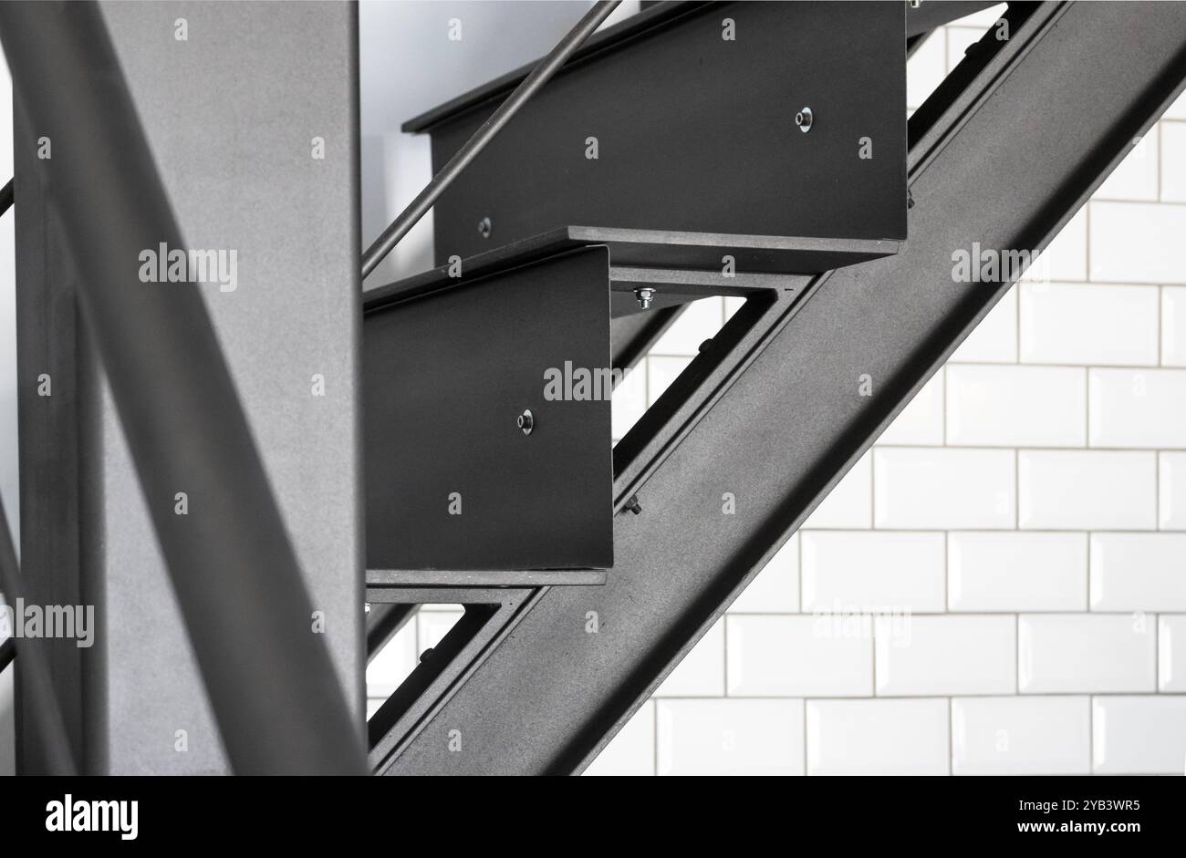 This modern metal staircase design features stylish black steps that ...