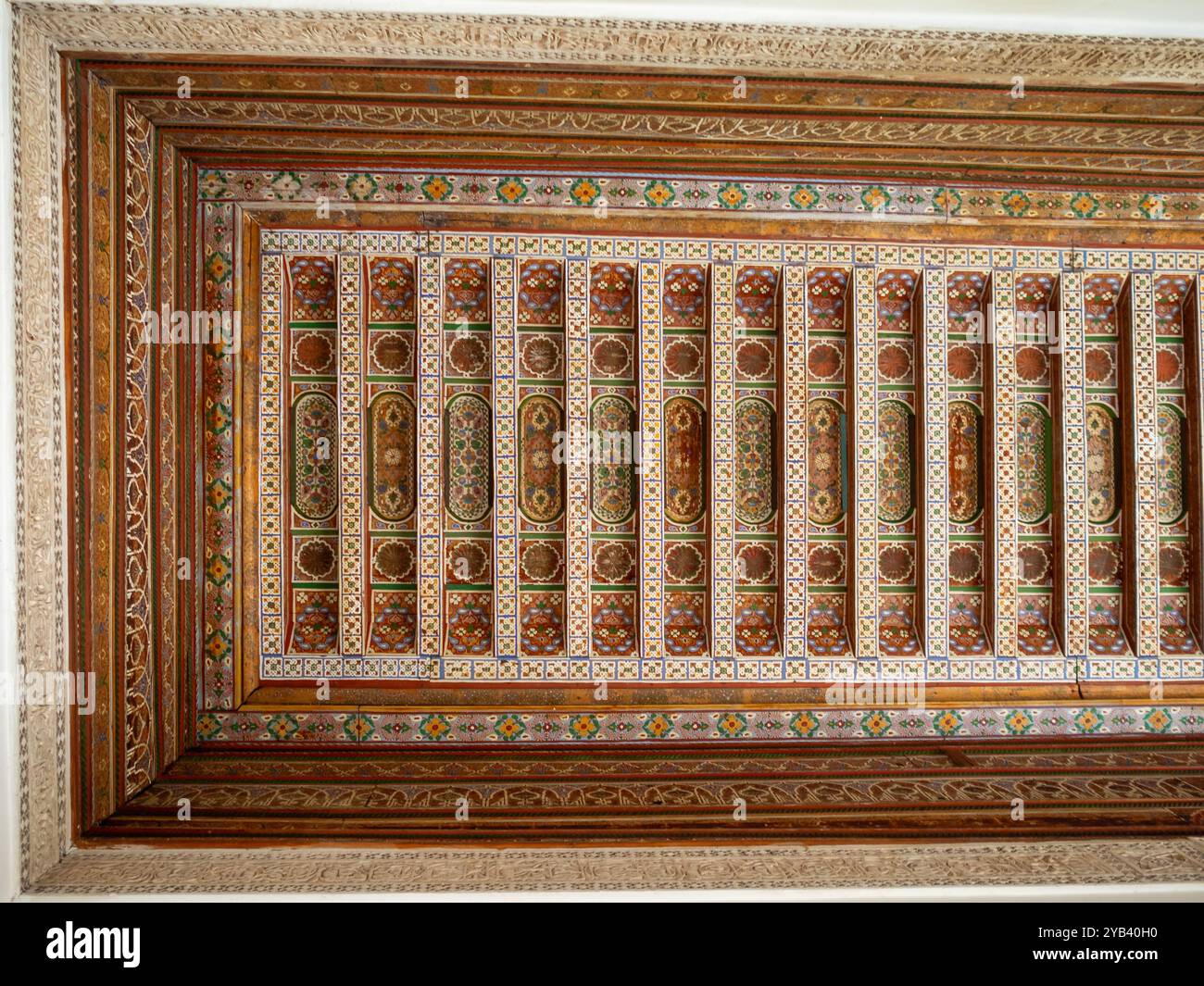 Painted wooden ceiling detail from a room of the Small Riad at Bahia ...