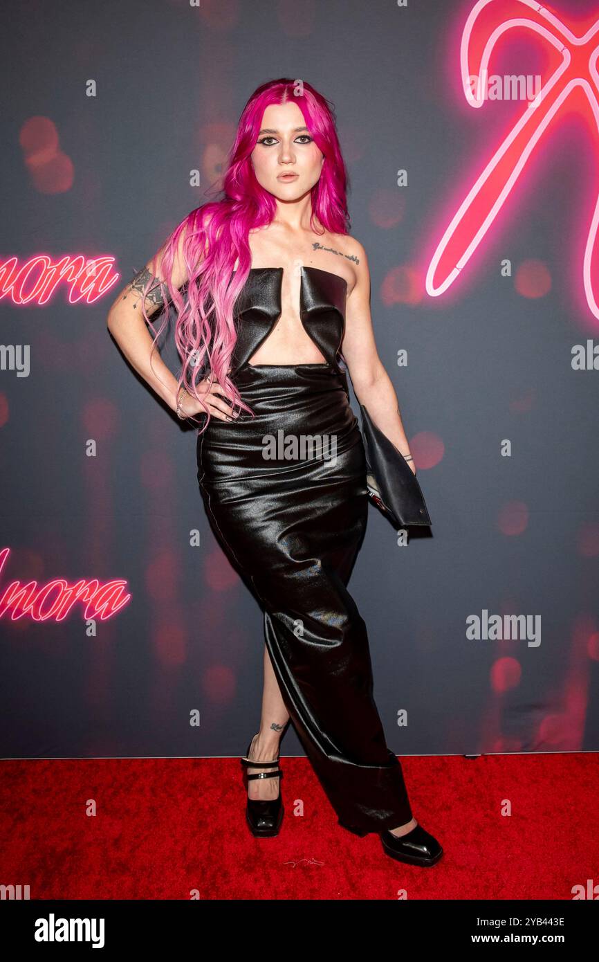 A guest attends the ''Anora'' New York premiere at Regal Times Square ...