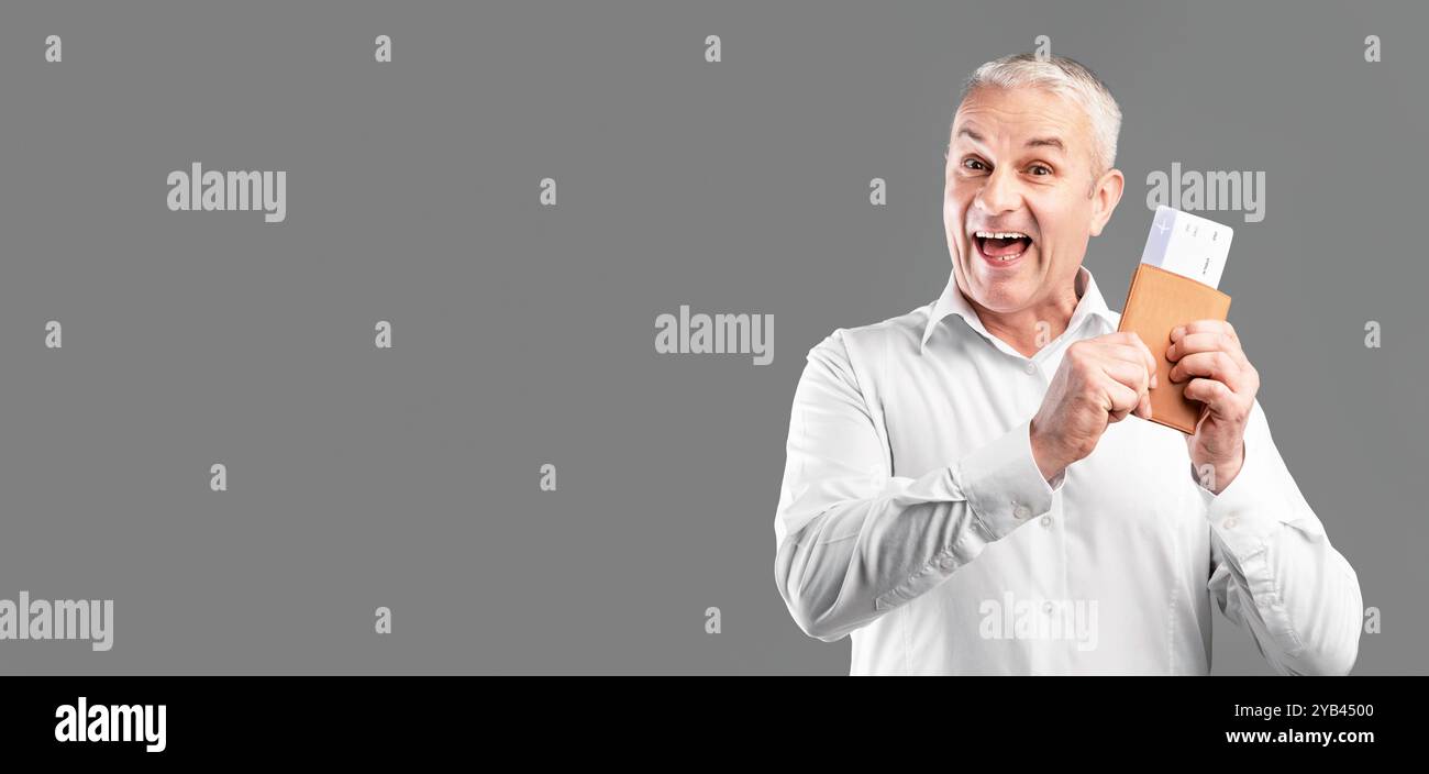 Excited happy man holding hi-res stock photography and images - Alamy