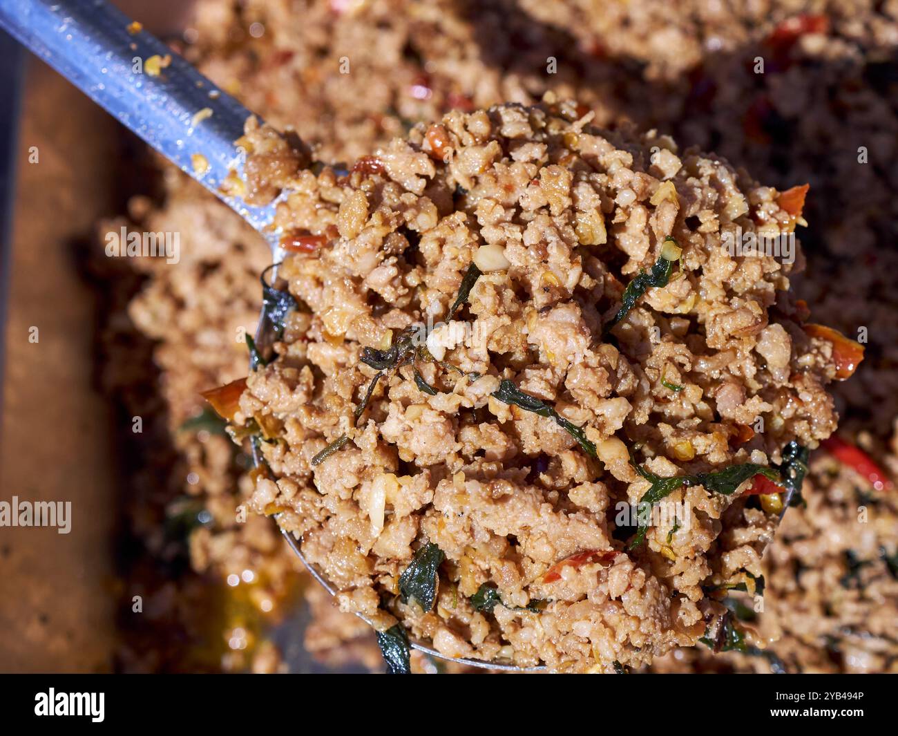 A big spoonful of Pad Ka Prao, the Thai pork and holy basil stir fry ...