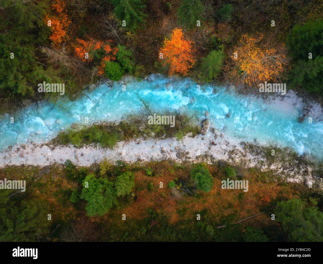 Aerial view of mountain river in colorful forest in autumn Stock Photo ...