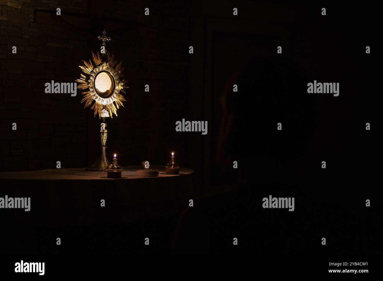 Adoration of the Blessed Sacrament at night in a community chapel in ...