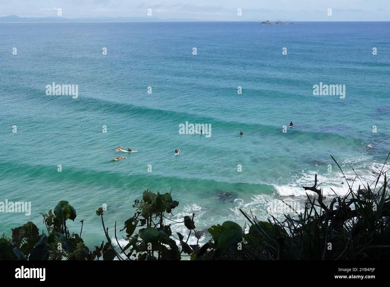 Surfing in Byron Bay, Wategos Beach Stock Photo - Alamy