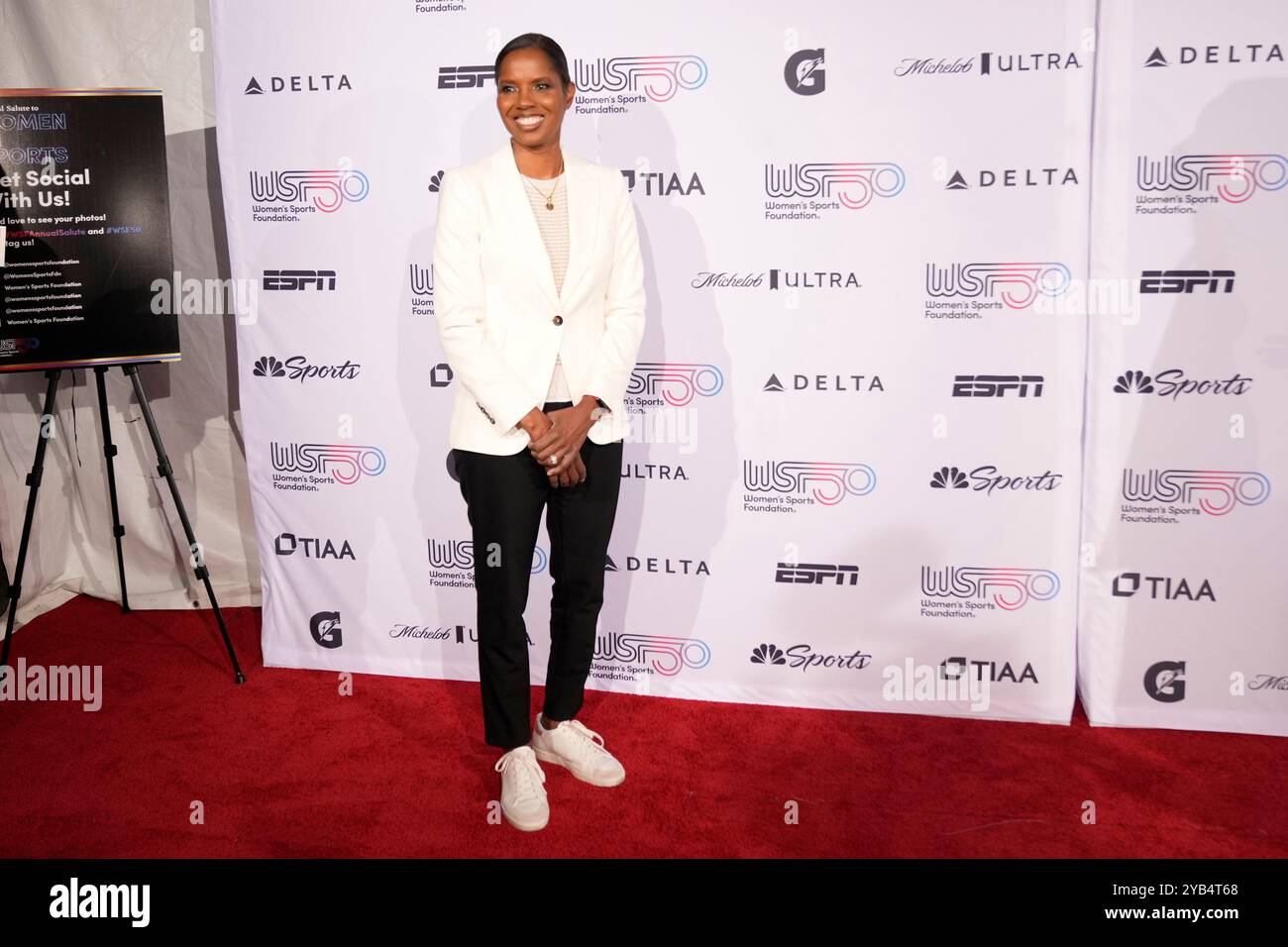 Briana Scurry poses for photos on the red carpet at the Women's Sports ...