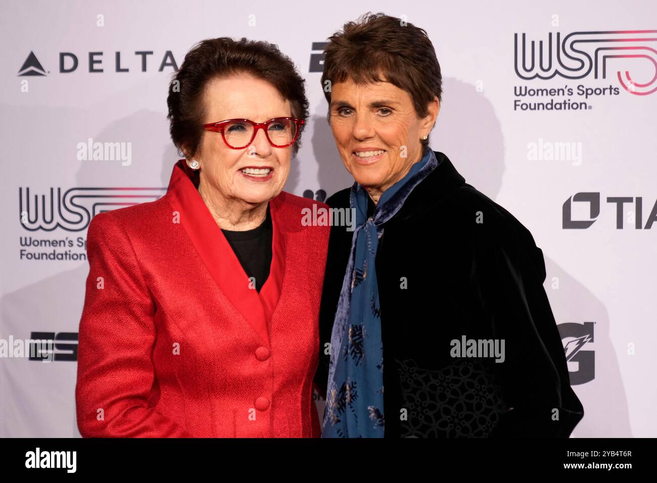 Billie Jean King, left, and Ilana Kloss, right, pose for photos on the ...