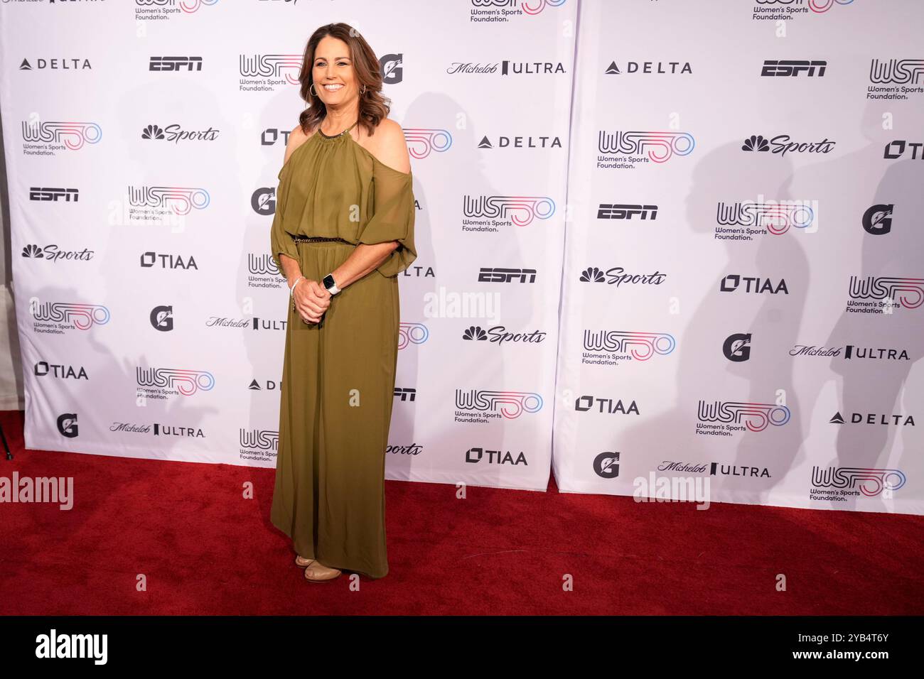Julie Foudy poses for photos on the red carpet at the Women's Sports ...