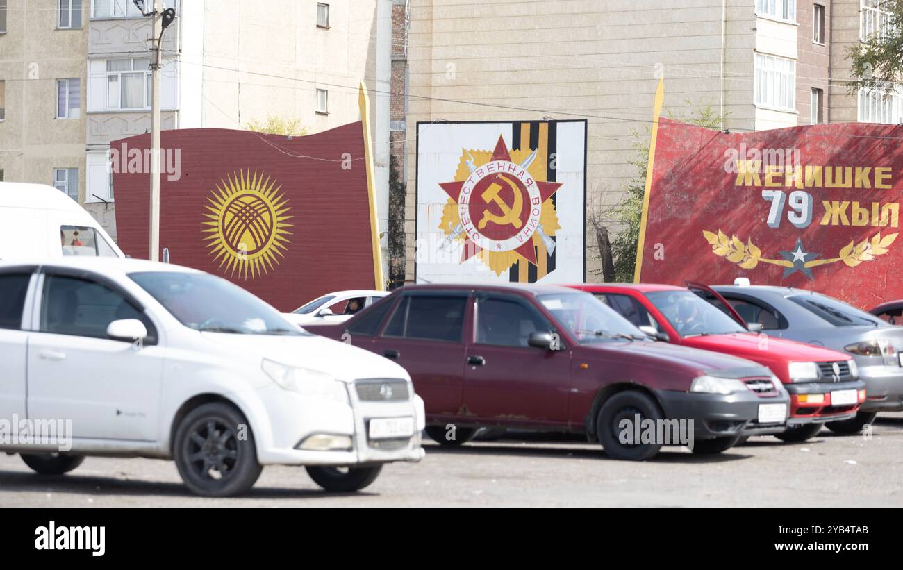 Tokmok, Kyrgyzstan - October 3 2024:the flags and logo of Soviet Union ...