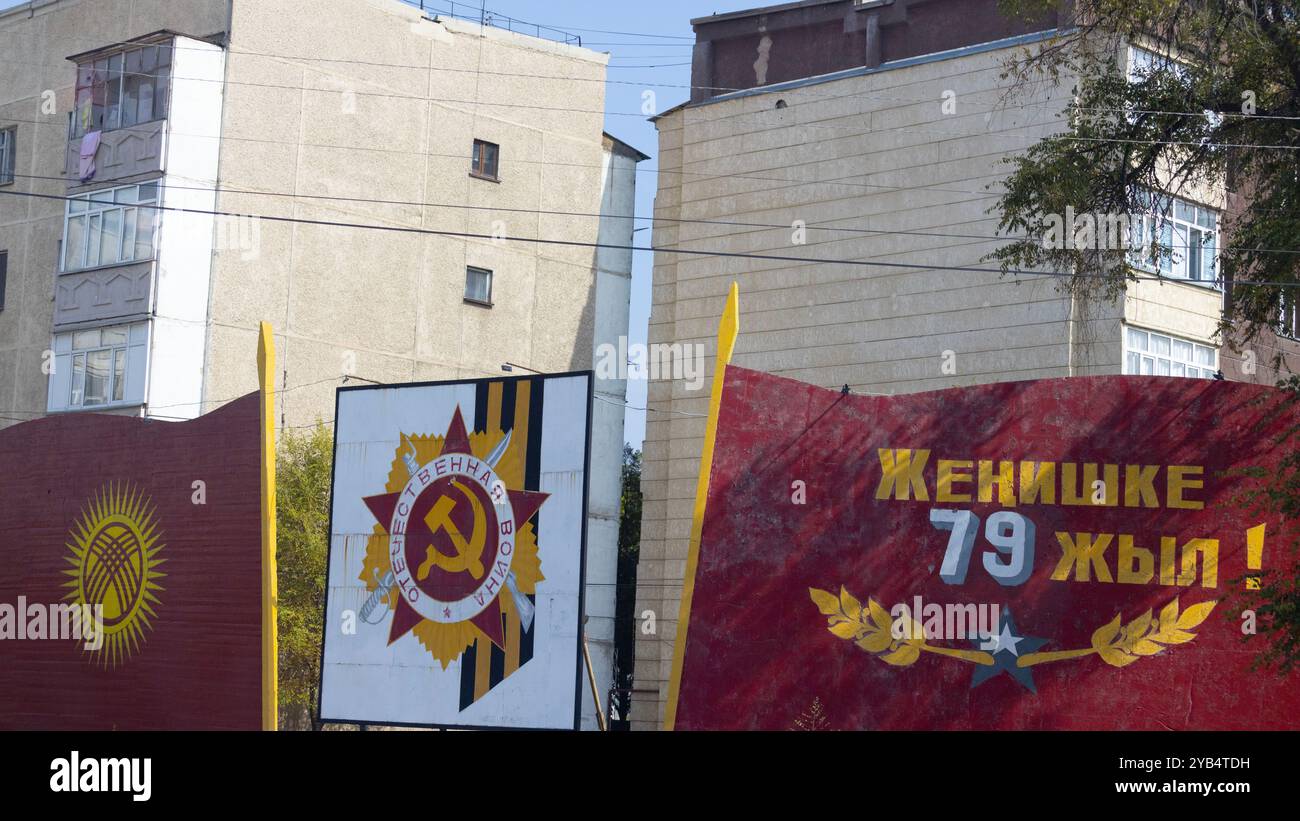Tokmok, Kyrgyzstan - October 3 2024:the flags and logo of Soviet Union ...